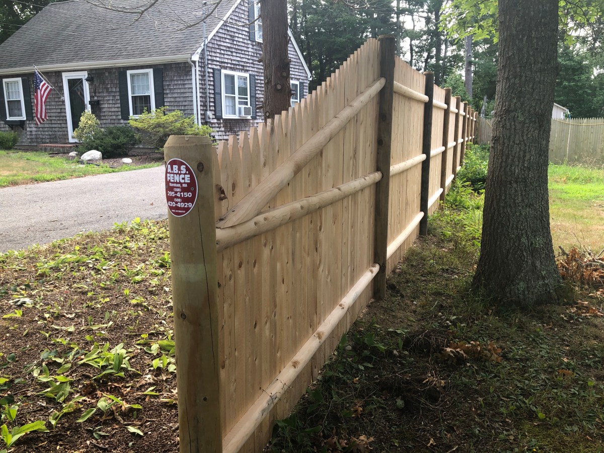 Cedar Stockade with Slope | ABS Fence Inc.